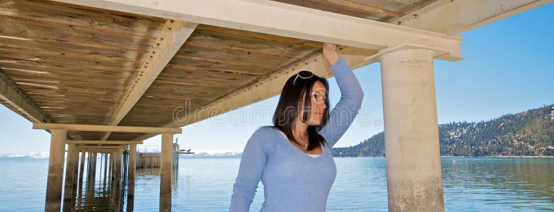 Girl Under a Pier at Vacation Resort Stock Image - Image of outdoor ...