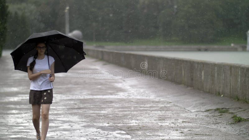 Girl Under the Umbrella in the Rain Stock Image - Image of child ...