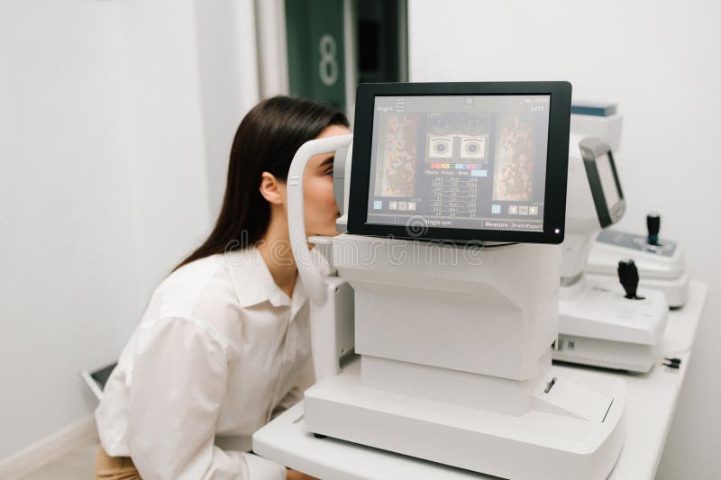 Girl Undergoes an OCT Eye Exam Using Advanced Optical Coherence ...