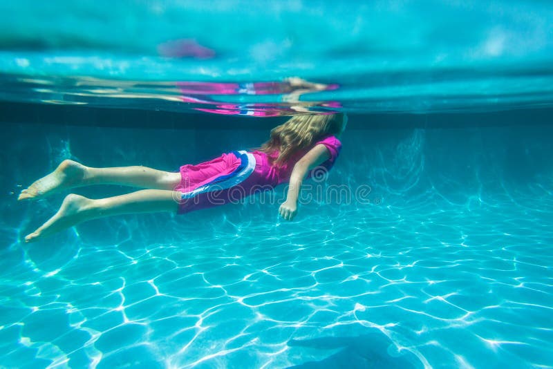 Girl Underwater Surfacing stock image. Image of teenager - 50000971