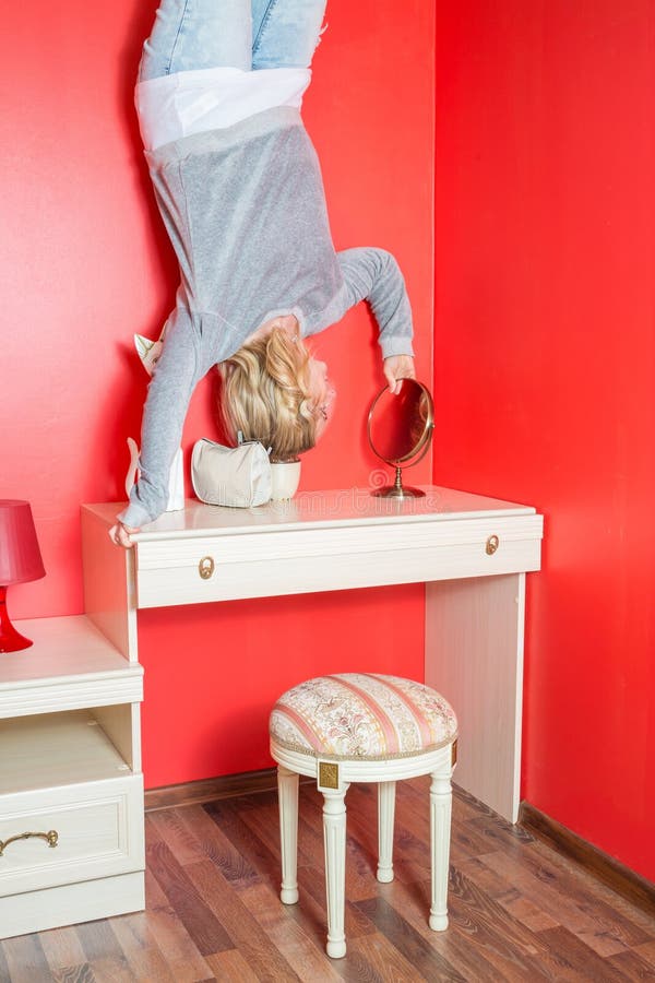 Girl Upside Down in the Bedroom Above the Dressing Stock Photo - Image ...