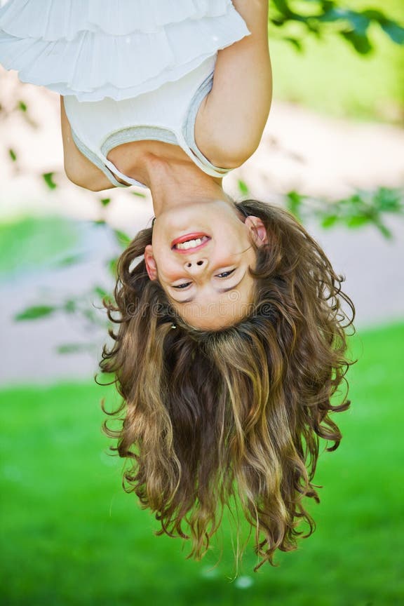 Girl upside down stock photo. Image of girl, smile, hanging - 31334738