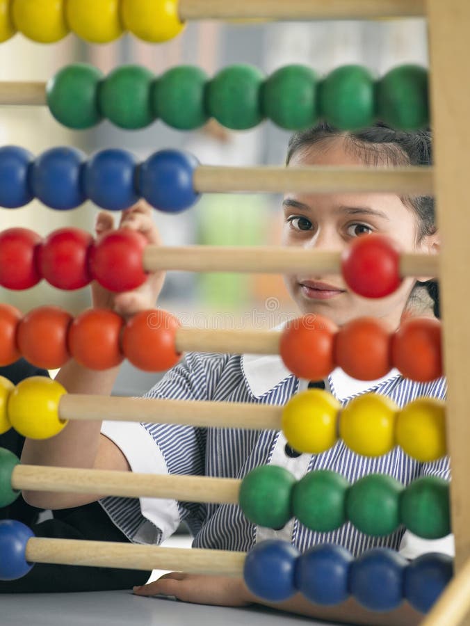 Girl Using Abacus in Classroom Stock Image - Image of childhood ...