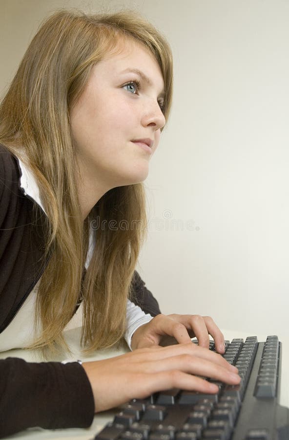 Girl using a computer stock photo. Image of communication - 1301574