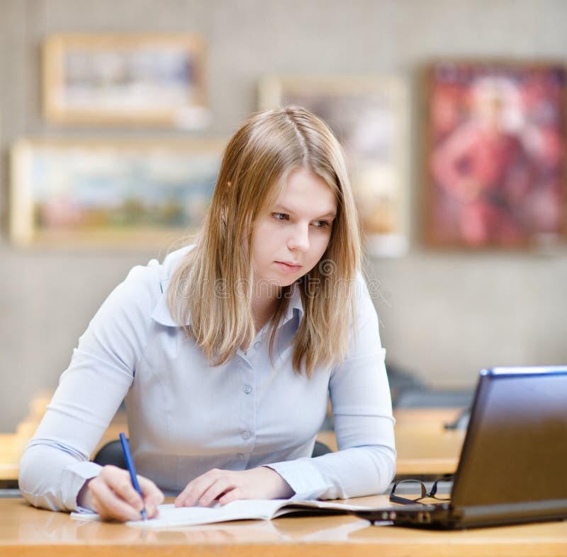 Girl Using Computer in a Library. Stock Image - Image of class, college ...