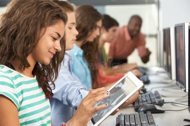 Girl Using Digital Tablet in Computer Class Stock Photo - Image of girl ...