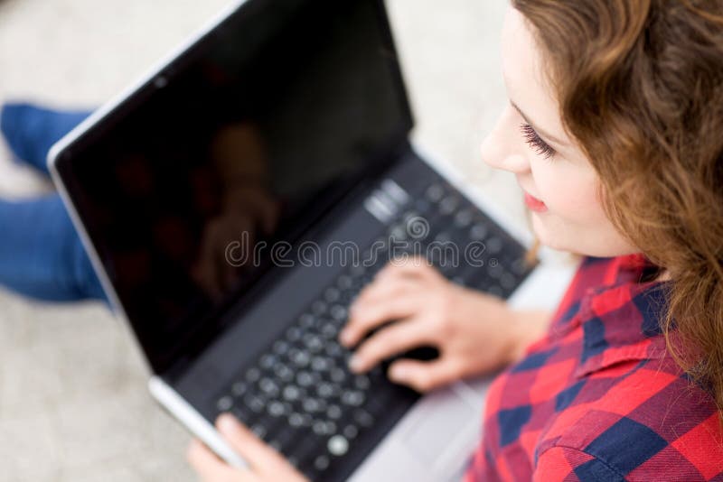Girl Using a Laptop on a Bench Stock Photo - Image of students, laptop ...