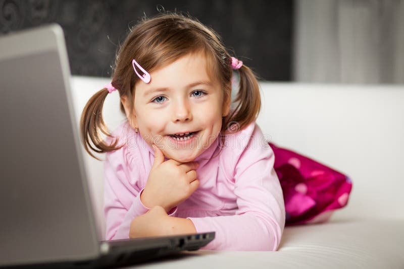 Girl using laptop stock image. Image of inside, caucasian - 27218761
