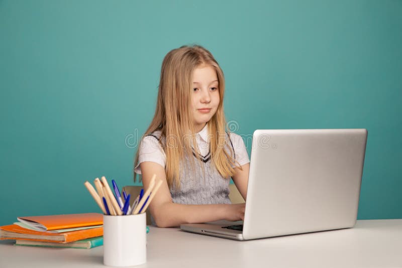 Girl Using a Laptop Computer at Stock Photo - Image of homework, little ...