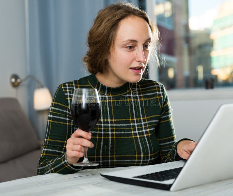 Girl Using Laptop Drinking Wine Stock Photo - Image of drink, smile ...