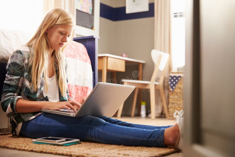 Girl Using Laptop in Her Bedroom Stock Image - Image of hair, floor ...