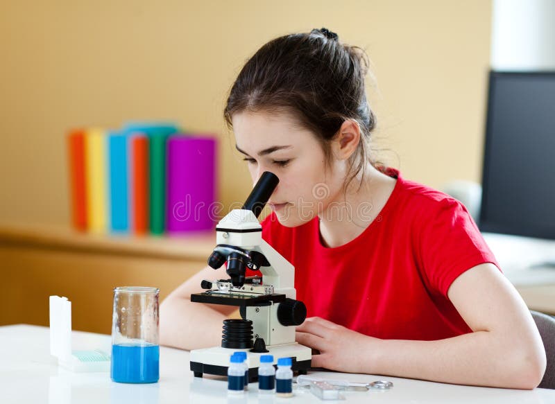 Student in Classroom Using a Microscope Stock Image - Image of student ...