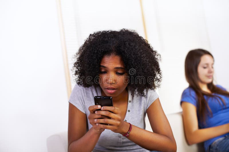 Girl using a mobile phone stock image. Image of excitement - 22563871