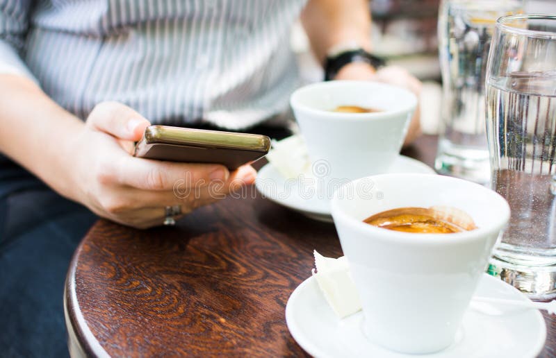 Girl Using Phone in Coffee Bar Stock Photo - Image of drink, modern ...