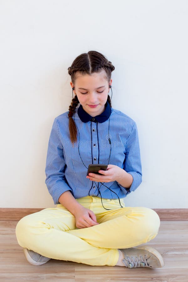 Girl Using A Phone Comfortably At Home Stock Image - Image of ...