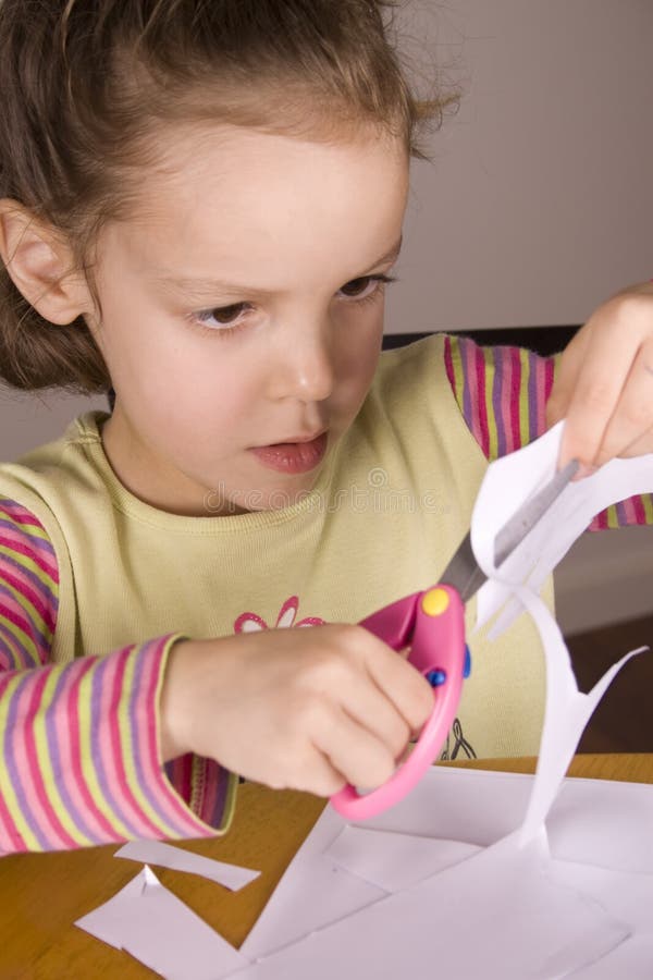 Girl using scissors stock image. Image of scissors, girl - 10314329