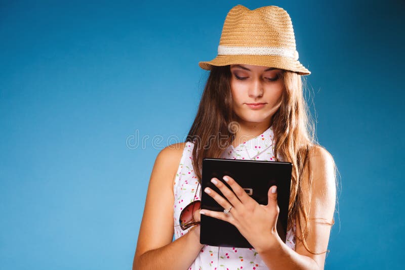 Girl Using Tablet Computer E-book Reader. Stock Photo - Image of young ...
