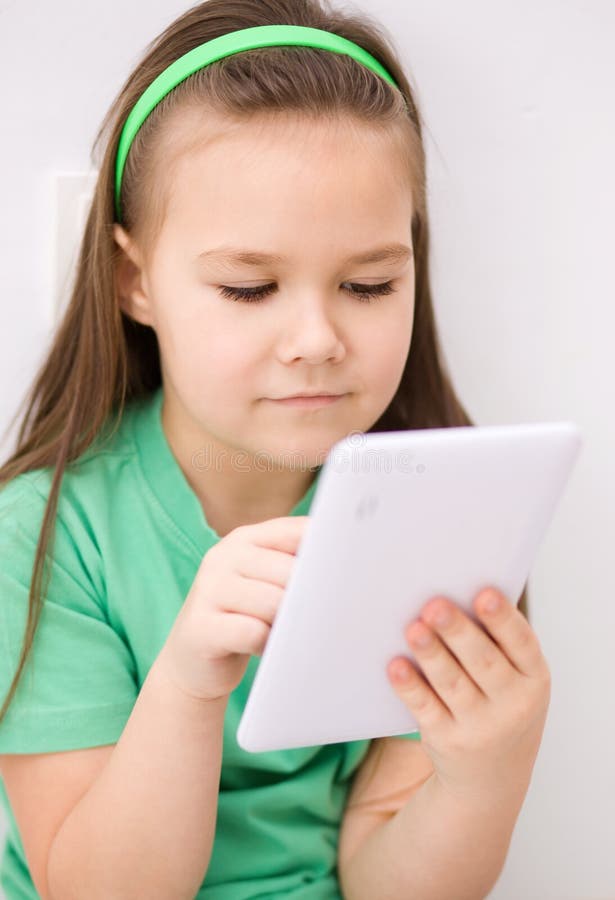 Girl using tablet stock image. Image of leisure, closeup - 36780279