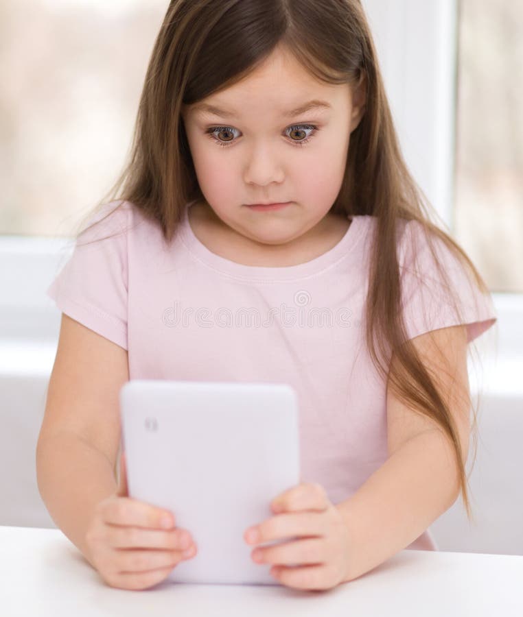 Girl using tablet stock image. Image of casual, lifestyle - 36780293