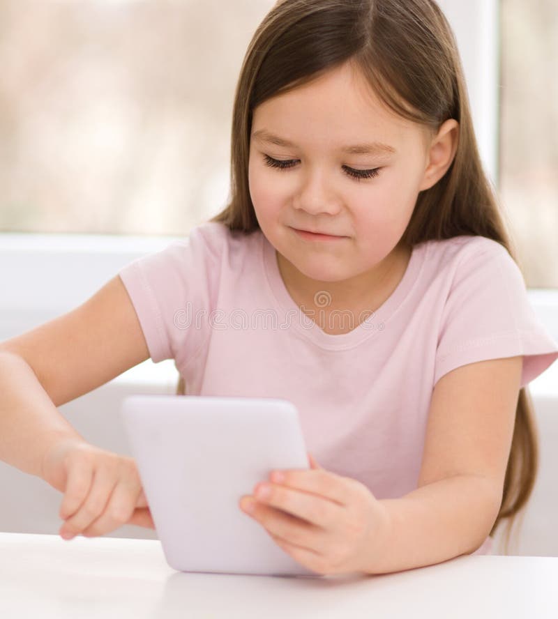 Girl using tablet stock image. Image of lifestyle, girl - 36840783