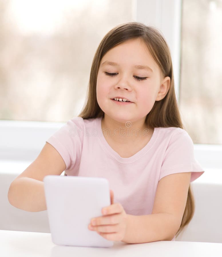 Girl using tablet stock photo. Image of casual, home - 36850844