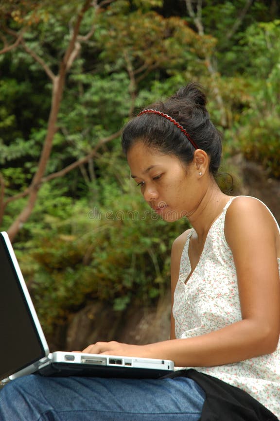 Girl on Vacation Using Laptop Computer Outside Stock Photo - Image of ...