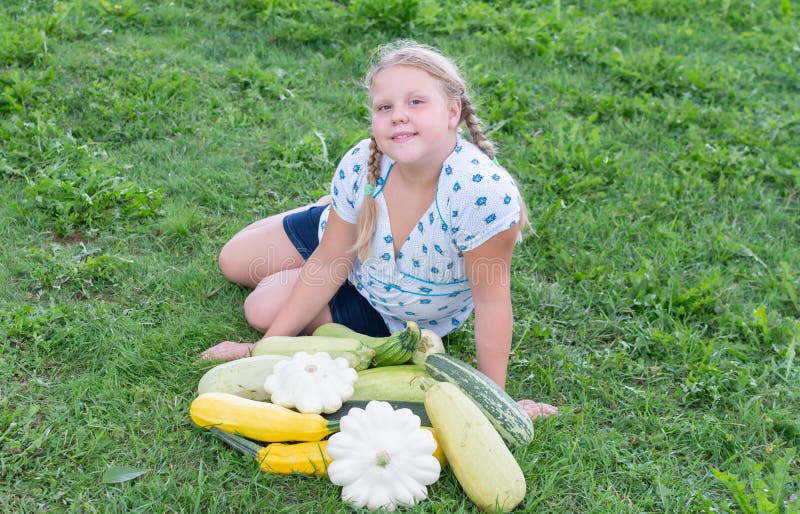 A girl with vegetables. stock photo. Image of harvest - 231433378