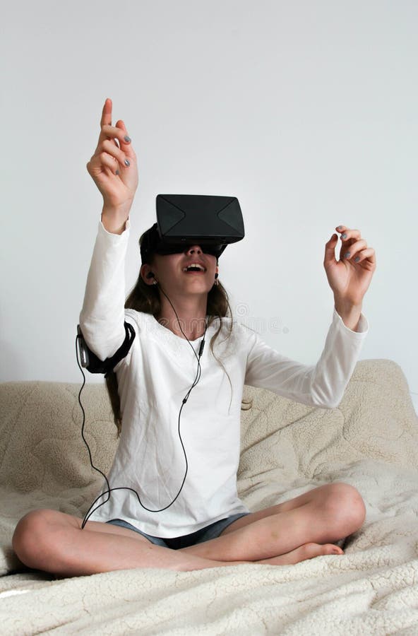 Girl in Virtual Reality Headset and Sound Device Looking Up and Stock ...