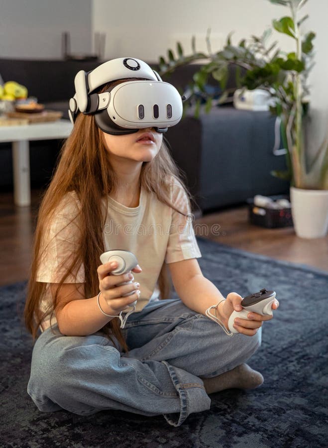 Girl in VR Glasses Playing a Game at Home. Learning and Playing with ...