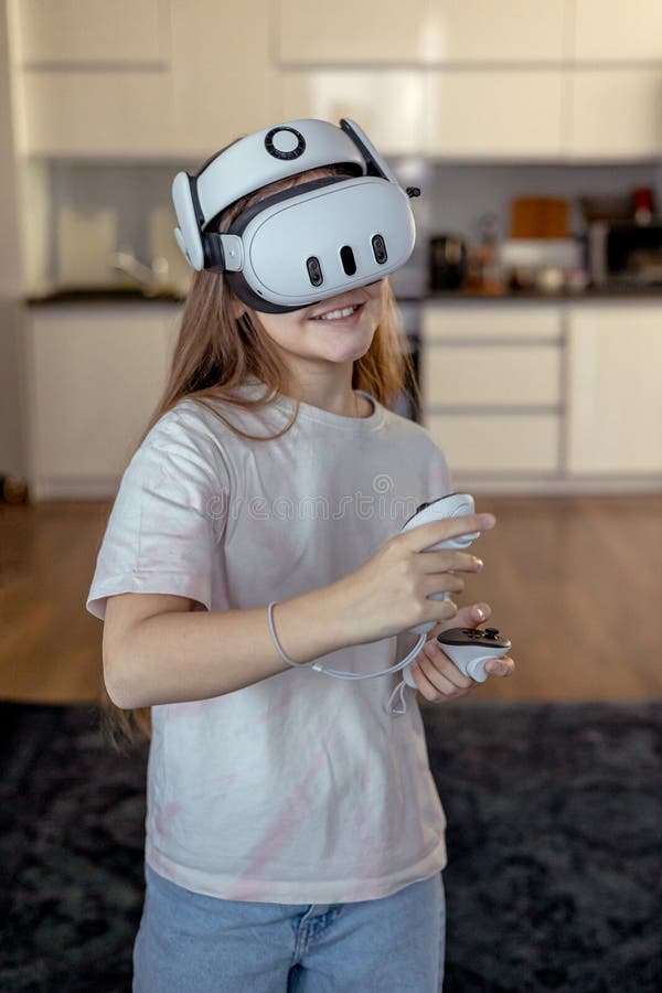 Girl in VR Glasses Playing a Game at Home. Learning and Playing with ...