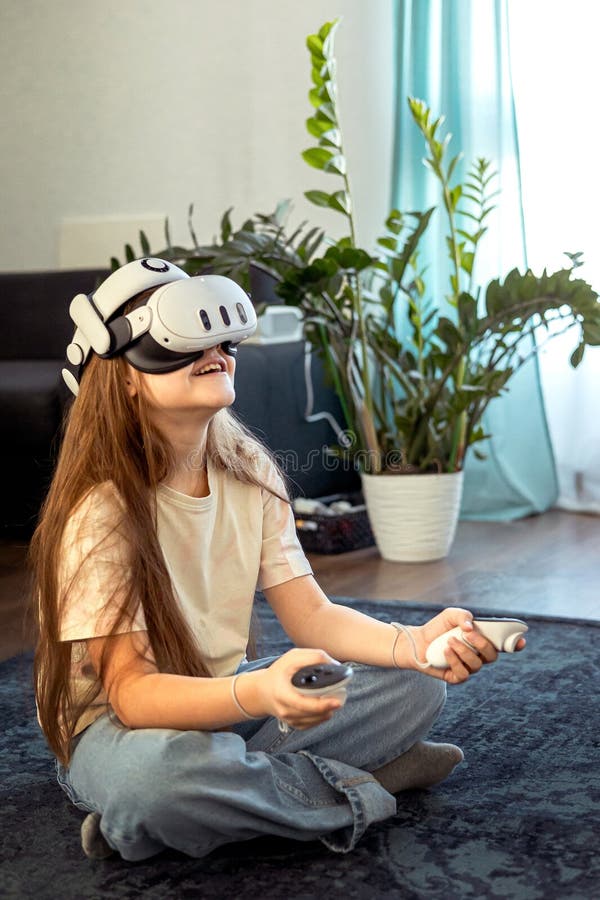 Girl in VR Glasses Playing a Game at Home. Learning and Playing with ...