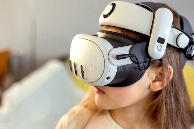 Girl in VR Glasses Playing a Game at Home. Learning and Playing with ...