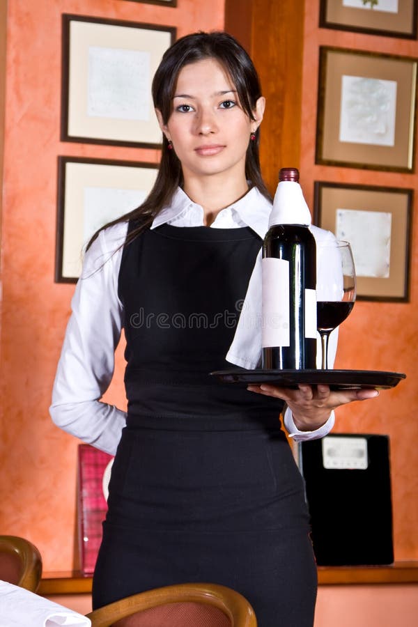 A Female Waiter with Wine on a Tray Stock Photo - Image of white ...