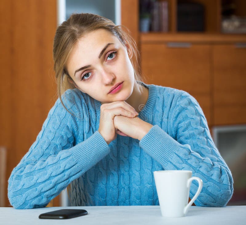 Girl waiting a phone call stock photo. Image of desperate - 64600850