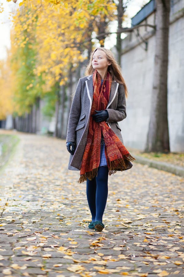 Girl walking on a fall day stock photo. Image of attractive - 29982474