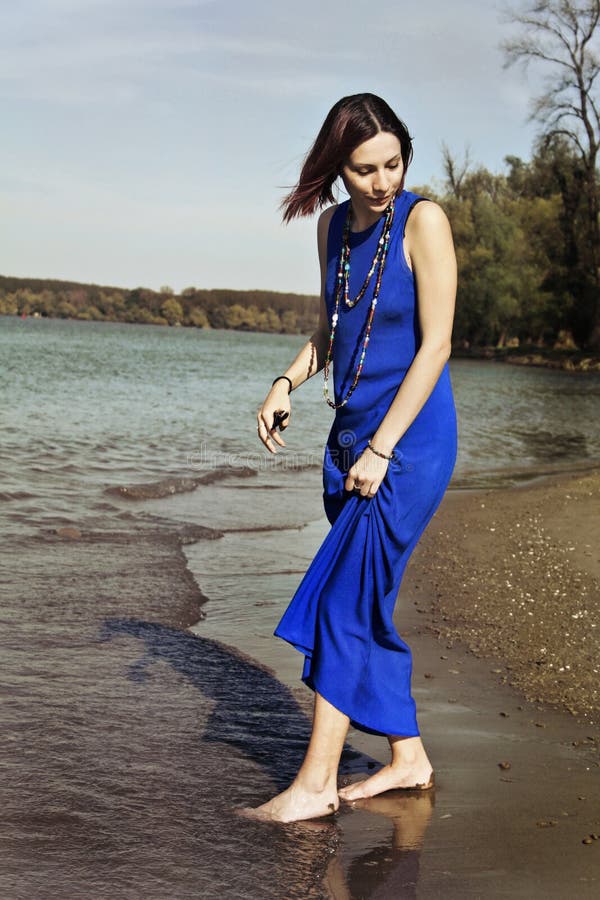 A Girl Standing by the River Stock Image - Image of trees, river: 78384719