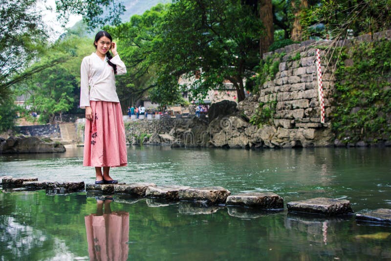 Girl Walking on the Stone Bridge in the River Stock Image - Image of ...