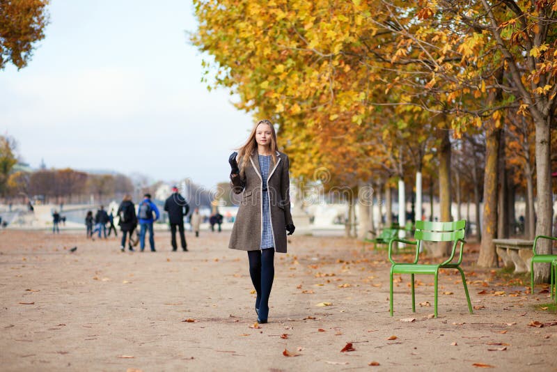 Girl walking on a fall day stock photo. Image of attractive - 29982474