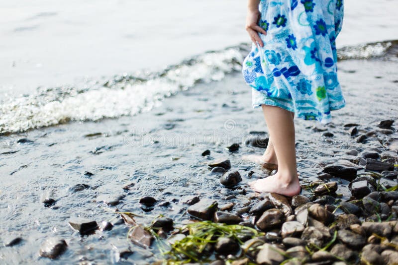 Girl Walking In Shallow Water Stock Photo - Image of dance, lagoon ...
