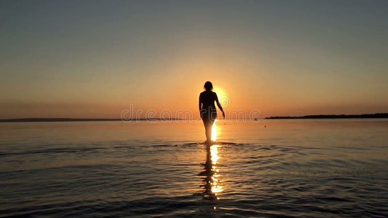 Girl Walks on Water at Sunset Stock Video - Video of landscape, island ...