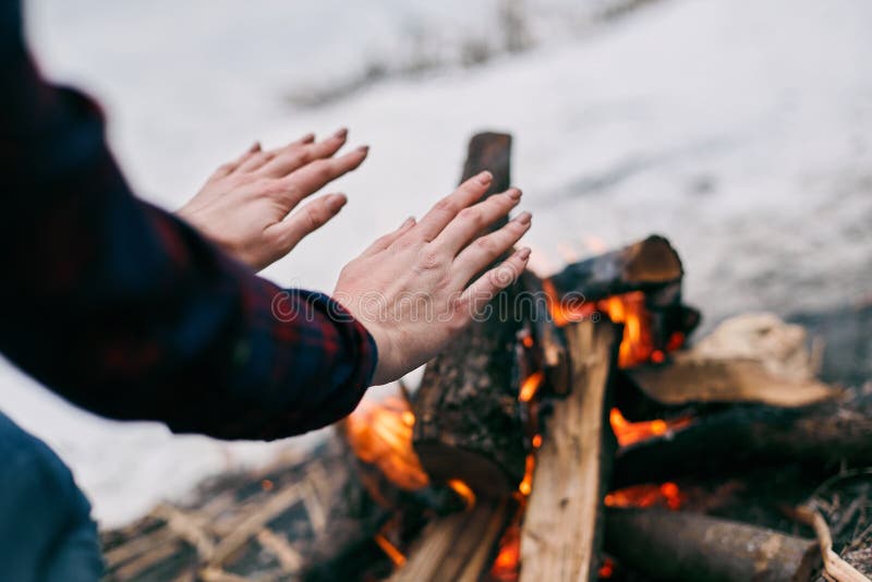 Man Warms His Hands Over Forever Burning Fire of Mount Chimaera in ...