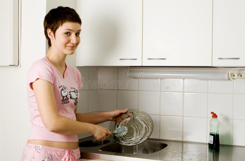 Girl washing the plate stock photo. Image of water, happy - 9286904
