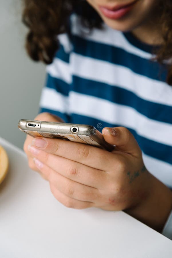 Girl Watching Her Smartphone Stock Photo - Image of girl, hungry: 90029280