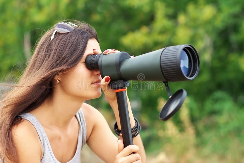 Girl Watching in Spotting Scope. Stock Image - Image of fingers ...