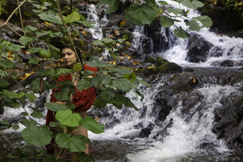 Girl in a waterfall stock image. Image of young, solitude - 41749789