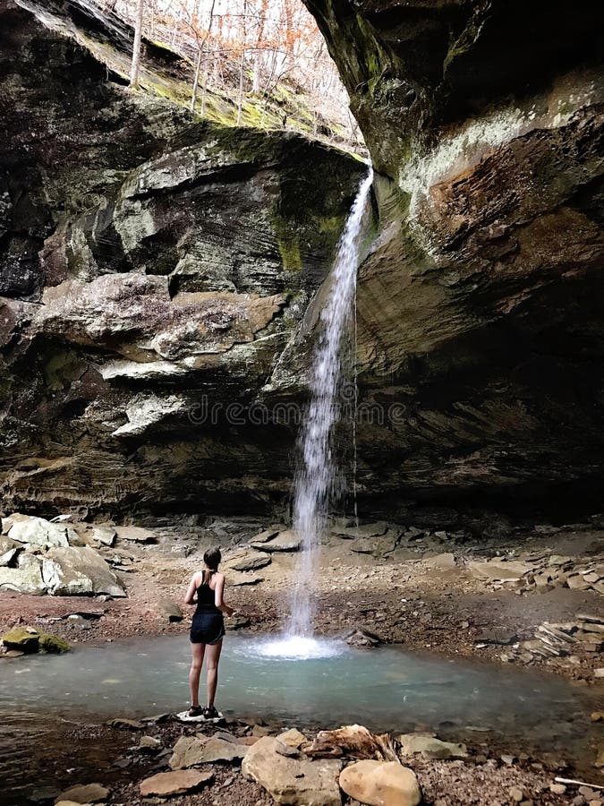 Girl at a waterfall stock photo. Image of looking, water - 140761150