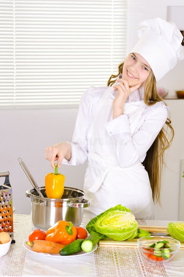 Portrait of Girl Wearing Chef Uniform Cooking on Kitchen Stock Image ...