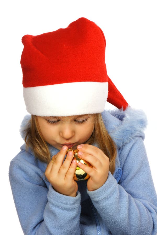 Girl wearing a Santa hat stock photo. Image of blue, ornament - 1255052