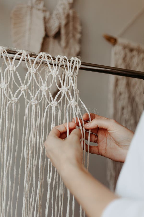 The Process of Weaving Macrame. Hands Weave Macrame Decor Stock Photo ...