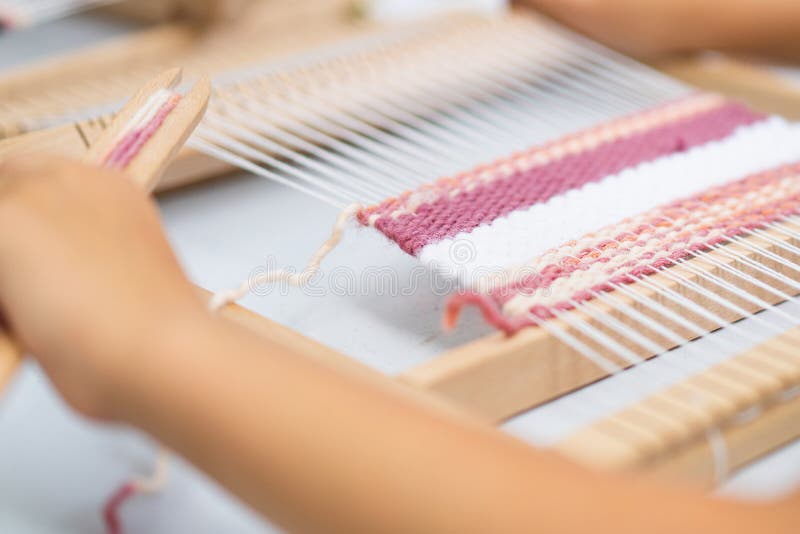 Girl Weaving Small Rug with Pattern at Masterclass on Weaving. Stock ...
